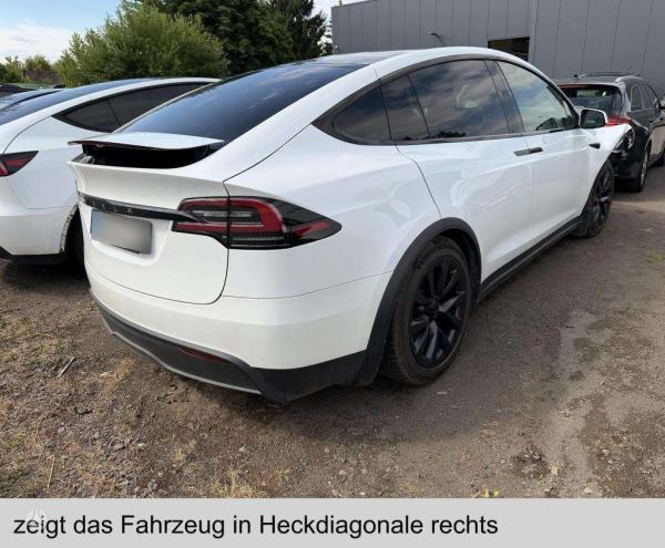 White Tesla Model X 2024 in Klaipeda, with an engine capacity of 0.00 L and mileage of 24 thousand km for 49800 €, photo 4 on AUTOMOTO.COM.LV