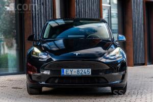 Black Tesla Model Y 2022 in Riga, with an engine capacity of 0.00 L and mileage of 41 thousand km for 38990 €, photo  on AUTOMOTO.COM.LV