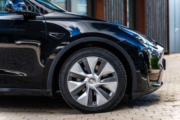 Black Tesla Model Y 2022 in Riga, with an engine capacity of 0.00 L and mileage of 41 thousand km for 38990 €, photo 9 on AUTOMOTO.COM.LV