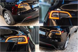 Black Tesla Model Y 2022 in Riga, with an engine capacity of 0.00 L and mileage of 41 thousand km for 38990 €, photo 13 on AUTOMOTO.COM.LV