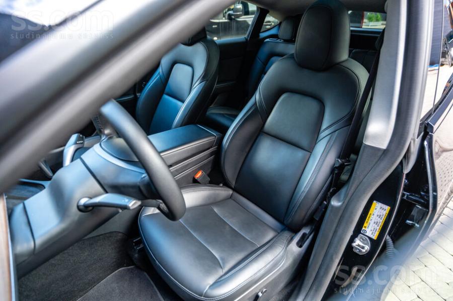 Black Tesla Model Y 2022 in Riga, with an engine capacity of 0.00 L and mileage of 41 thousand km for 38990 €, photo 16 on AUTOMOTO.COM.LV