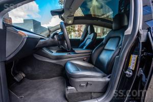 Black Tesla Model Y 2022 in Riga, with an engine capacity of 0.00 L and mileage of 41 thousand km for 38990 €, photo 17 on AUTOMOTO.COM.LV