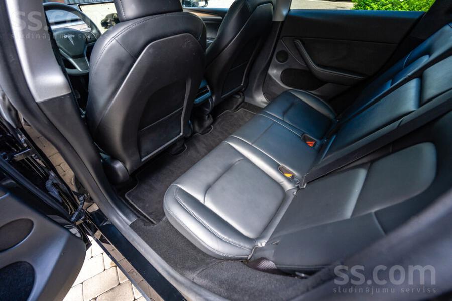 Black Tesla Model Y 2022 in Riga, with an engine capacity of 0.00 L and mileage of 41 thousand km for 38990 €, photo 18 on AUTOMOTO.COM.LV
