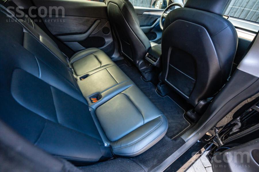 Black Tesla Model Y 2022 in Riga, with an engine capacity of 0.00 L and mileage of 41 thousand km for 38990 €, photo 19 on AUTOMOTO.COM.LV