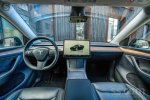 Black Tesla Model Y 2022 in Riga, with an engine capacity of 0.00 L and mileage of 41 thousand km for 38990 €, photo 23 on AUTOMOTO.COM.LV