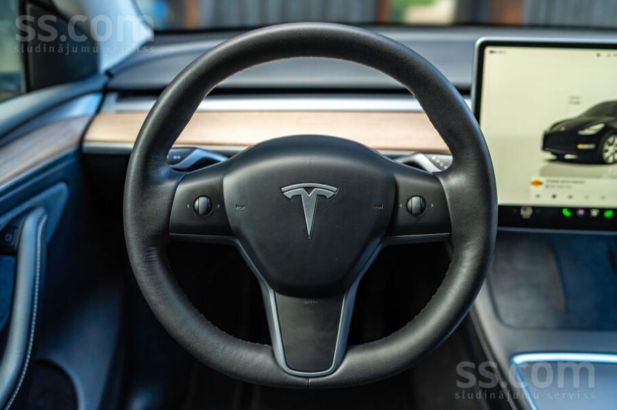 Black Tesla Model Y 2022 in Riga, with an engine capacity of 0.00 L and mileage of 41 thousand km for 38990 €, photo 24 on AUTOMOTO.COM.LV
