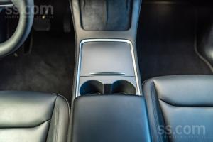 Black Tesla Model Y 2022 in Riga, with an engine capacity of 0.00 L and mileage of 41 thousand km for 38990 €, photo 25 on AUTOMOTO.COM.LV