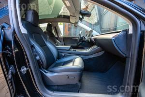 Black Tesla Model Y 2022 in Riga, with an engine capacity of 0.00 L and mileage of 41 thousand km for 38990 €, photo 32 on AUTOMOTO.COM.LV