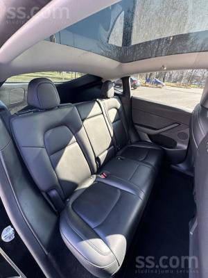 Black Tesla Model Y 2021 in Riga, with an engine capacity of 0.00 L and mileage of 88 thousand km for 30400 €, photo 7 on AUTOMOTO.COM.LV