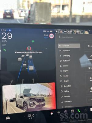 Black Tesla Model Y 2021 in Riga, with an engine capacity of 0.00 L and mileage of 88 thousand km for 30400 €, photo 15 on AUTOMOTO.COM.LV