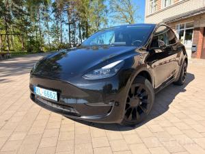 Black Tesla Model Y 2021 in Ogre, with an engine capacity of 0.00 L and mileage of 133 thousand km for 30500 €, photo 3 on AUTOMOTO.COM.LV