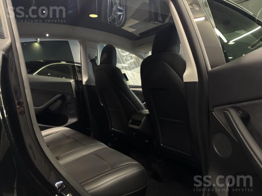 Melns Tesla Model Y 2021 Rīga, ar dzinēja tilpumu 0.00 L un nobraukumu 90 tūkst. km par 31990 €, foto 26 vietnē AUTOMOTO.COM.LV