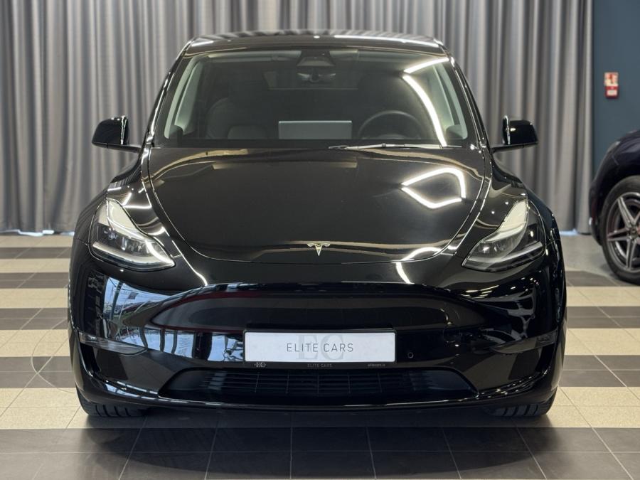 Black Tesla Model Y 2021 in Riga, with an engine capacity of 0.00 L and mileage of 90 thousand km for 31990 €, photo 1 on AUTOMOTO.COM.LV