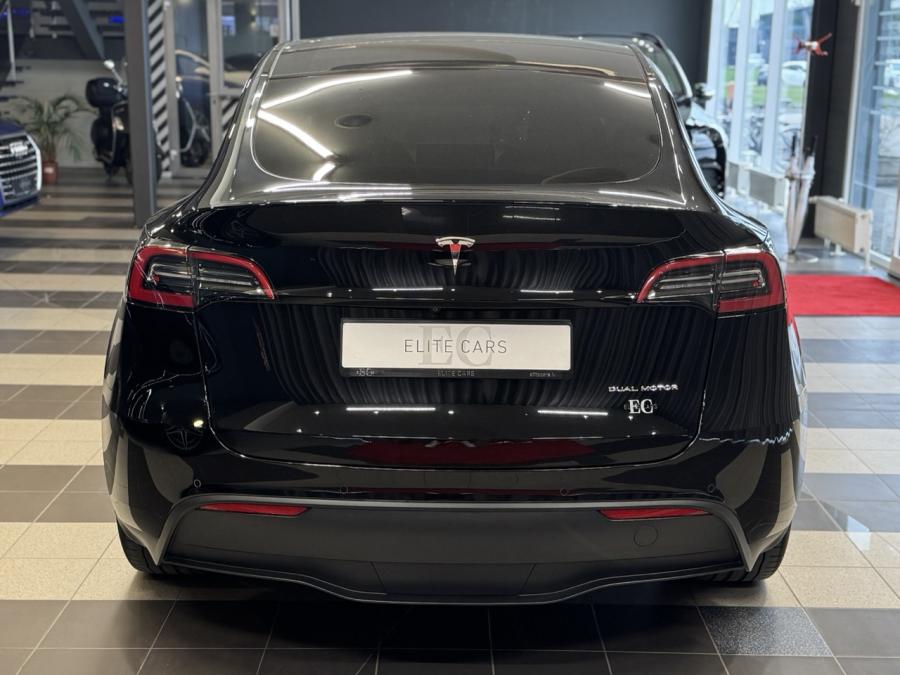 Black Tesla Model Y 2021 in Riga, with an engine capacity of 0.00 L and mileage of 90 thousand km for 31990 €, photo 5 on AUTOMOTO.COM.LV