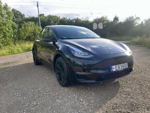 Black Tesla Model Y 2021 in Klaipeda, with an engine capacity of 0.00 L and mileage of 101 thousand km for 21999 €, photo  on AUTOMOTO.COM.LV