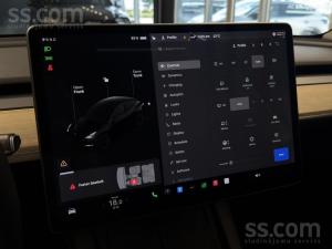 Black Tesla Model Y 2021 in Riga, with an engine capacity of 0.00 L and mileage of 106 thousand km for 32990 €, photo 13 on AUTOMOTO.COM.LV