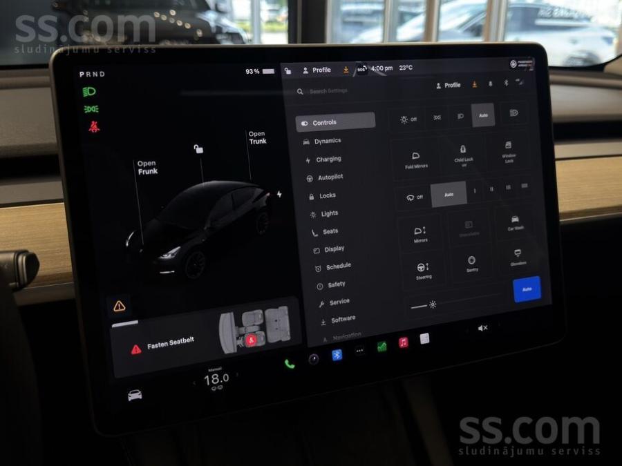 Black Tesla Model Y 2021 in Riga, with an engine capacity of 0.00 L and mileage of 106 thousand km for 32990 €, photo 13 on AUTOMOTO.COM.LV