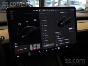 Black Tesla Model Y 2021 in Riga, with an engine capacity of 0.00 L and mileage of 106 thousand km for 32990 €, photo 14 on AUTOMOTO.COM.LV