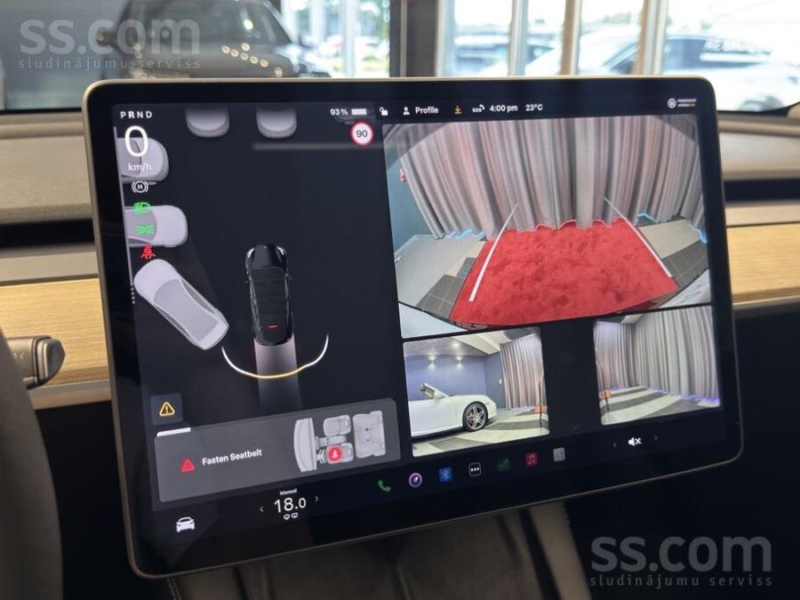 Black Tesla Model Y 2021 in Riga, with an engine capacity of 0.00 L and mileage of 106 thousand km for 32990 €, photo 17 on AUTOMOTO.COM.LV