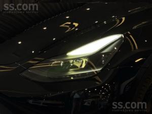 Black Tesla Model Y 2021 in Riga, with an engine capacity of 0.00 L and mileage of 106 thousand km for 32990 €, photo 28 on AUTOMOTO.COM.LV