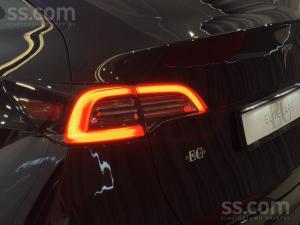 Black Tesla Model Y 2021 in Riga, with an engine capacity of 0.00 L and mileage of 106 thousand km for 32990 €, photo 29 on AUTOMOTO.COM.LV