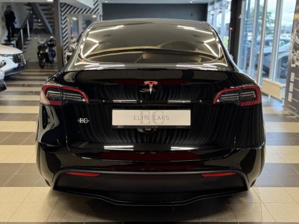 Melns Tesla Model Y 2021 Rīga, ar dzinēja tilpumu 0.00 L un nobraukumu 106 tūkst. km par 32990 €, foto 4 vietnē AUTOMOTO.COM.LV