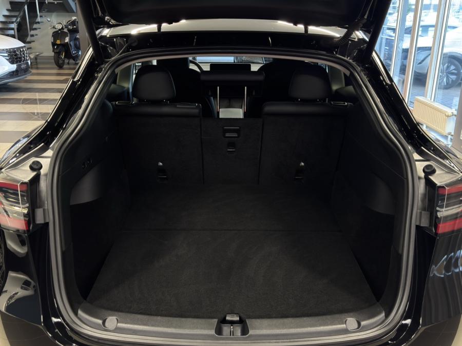 Black Tesla Model Y 2021 in Riga, with an engine capacity of 0.00 L and mileage of 106 thousand km for 32990 €, photo 26 on AUTOMOTO.COM.LV