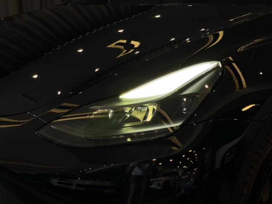 Black Tesla Model Y 2021 in Riga, with an engine capacity of 0.00 L and mileage of 106 thousand km for 32990 €, photo 27 on AUTOMOTO.COM.LV