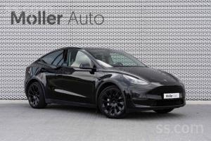 Black Tesla Model Y 2022 in Riga, with an engine capacity of 0.00 L and mileage of 90 thousand km for 35950 €, photo 2 on AUTOMOTO.COM.LV