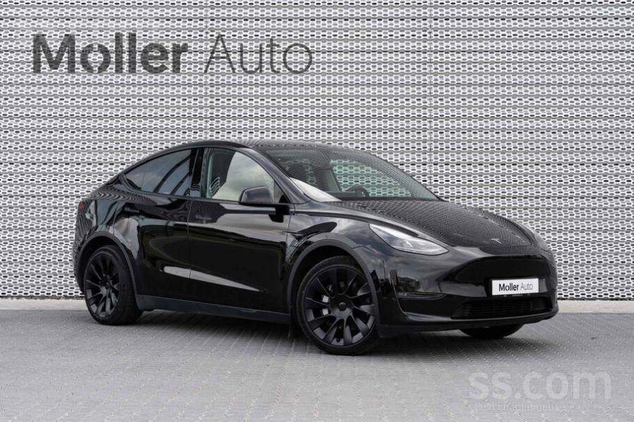 Black Tesla Model Y 2022 in Riga, with an engine capacity of 0.00 L and mileage of 90 thousand km for 35950 €, photo 2 on AUTOMOTO.COM.LV