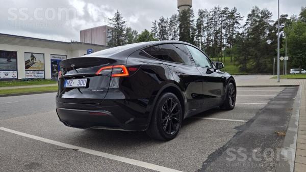 Melns Tesla Model Y 2022 Rīga, ar dzinēja tilpumu 0.00 L un nobraukumu 99 tūkst. km par 35000 €, foto 2 vietnē AUTOMOTO.COM.LV