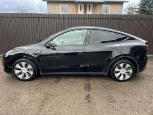 Black Tesla Model Y 2022 in Kaunas, with an engine capacity of 0.00 L and mileage of 160 thousand km for 13500 €, photo 5 on AUTOMOTO.COM.LV
