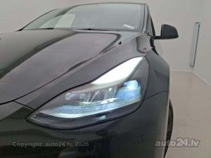 Black Tesla Model Y 2022 in Viljandi, with an engine capacity of 0.00 L and mileage of 87 thousand km for 32999 €, photo 4 on AUTOMOTO.COM.LV
