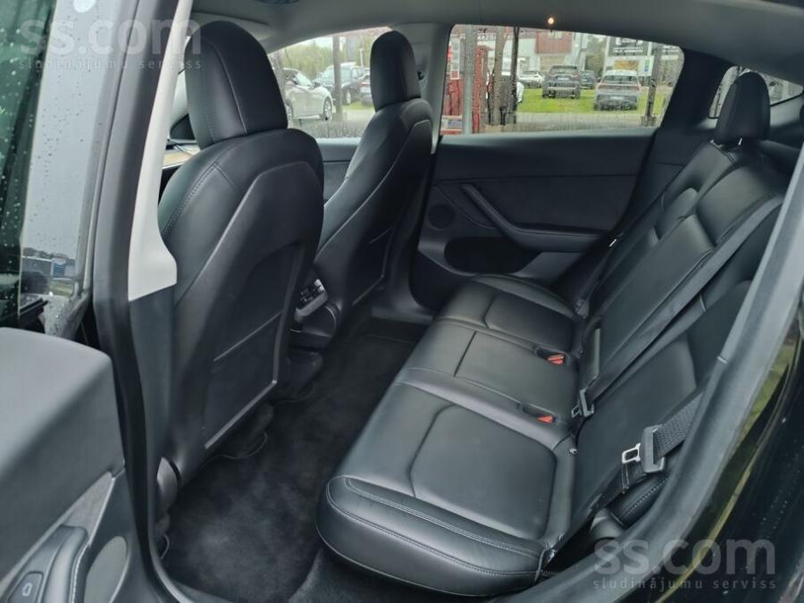 Black Tesla Model Y 2022 in Riga, with an engine capacity of 0.00 L and mileage of 74 thousand km for 31700 €, photo 9 on AUTOMOTO.COM.LV