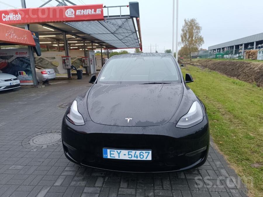 Black Tesla Model Y 2022 in Riga, with an engine capacity of 0.00 L and mileage of 74 thousand km for 31700 €, photo 10 on AUTOMOTO.COM.LV