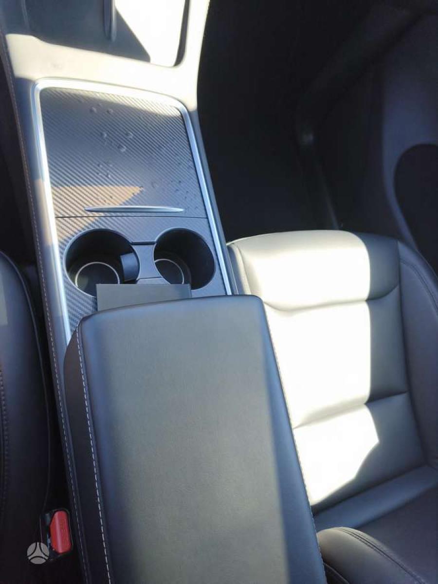 Black Tesla Model Y 2022 in Taurage, with an engine capacity of 0.00 L and mileage of 262 thousand km for 21500 €, photo 19 on AUTOMOTO.COM.LV