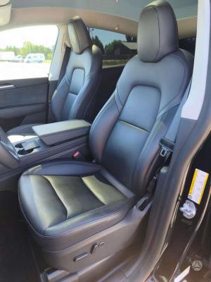 Black Tesla Model Y 2022 in Taurage, with an engine capacity of 0.00 L and mileage of 262 thousand km for 21500 €, photo 20 on AUTOMOTO.COM.LV