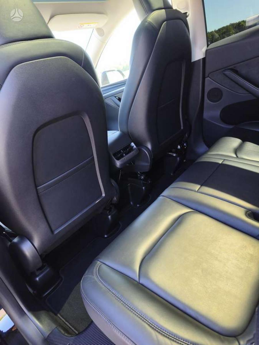 Black Tesla Model Y 2022 in Taurage, with an engine capacity of 0.00 L and mileage of 262 thousand km for 21500 €, photo 22 on AUTOMOTO.COM.LV