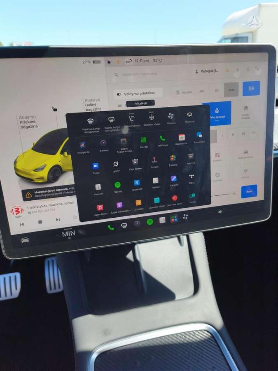 Black Tesla Model Y 2022 in Taurage, with an engine capacity of 0.00 L and mileage of 262 thousand km for 21500 €, photo 25 on AUTOMOTO.COM.LV