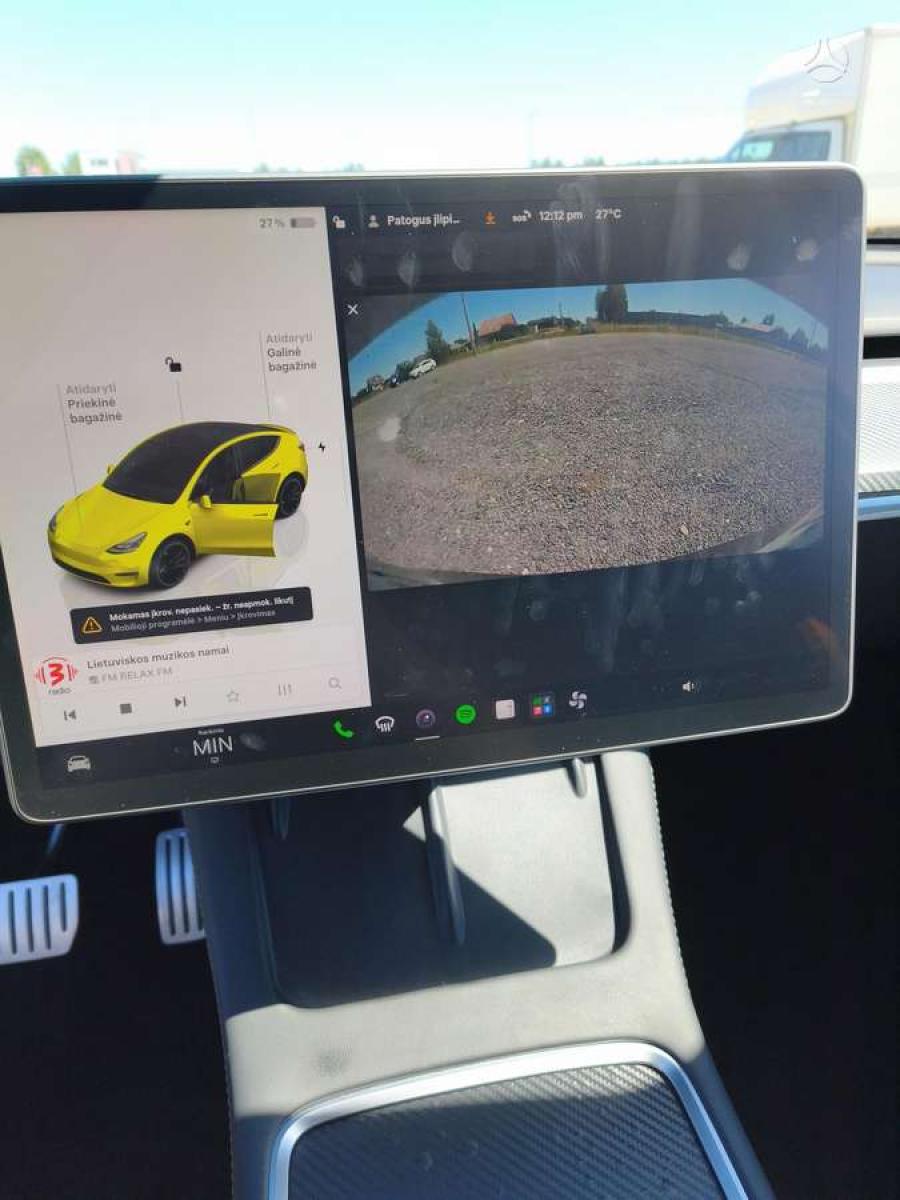 Black Tesla Model Y 2022 in Taurage, with an engine capacity of 0.00 L and mileage of 262 thousand km for 21500 €, photo 26 on AUTOMOTO.COM.LV
