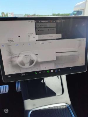 Black Tesla Model Y 2022 in Taurage, with an engine capacity of 0.00 L and mileage of 262 thousand km for 21500 €, photo 27 on AUTOMOTO.COM.LV
