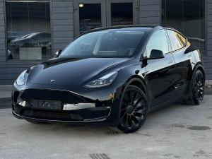 Black Tesla Model Y 2022 in Jelgava, with an engine capacity of 0.00 L and mileage of 80 thousand km for 31900 €, photo 4 on AUTOMOTO.COM.LV