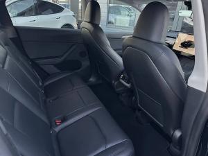 Black Tesla Model Y 2022 in Jelgava, with an engine capacity of 0.00 L and mileage of 80 thousand km for 31900 €, photo 8 on AUTOMOTO.COM.LV