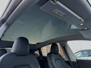 Black Tesla Model Y 2022 in Jelgava, with an engine capacity of 0.00 L and mileage of 80 thousand km for 31900 €, photo 9 on AUTOMOTO.COM.LV
