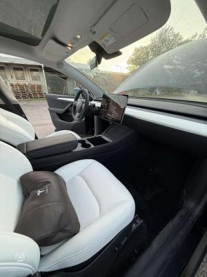Черный Тесла Модель Y 2022 в Каунас, объемом двигателя 0.00 л и пробегом 82 тыс. км за 23990 €, фото 18 на AUTOMOTO.COM.LV