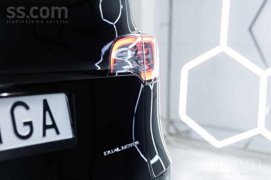 Black Tesla Model Y 2022 in Riga, with an engine capacity of 0.00 L and mileage of 79 thousand km for 34740 €, photo 9 on AUTOMOTO.COM.LV