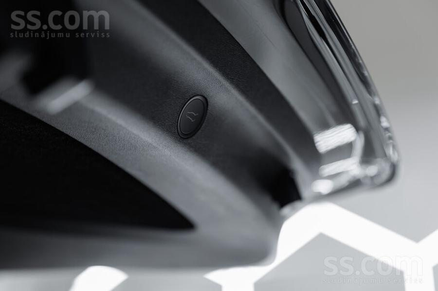 Black Tesla Model Y 2022 in Riga, with an engine capacity of 0.00 L and mileage of 79 thousand km for 34740 €, photo 11 on AUTOMOTO.COM.LV