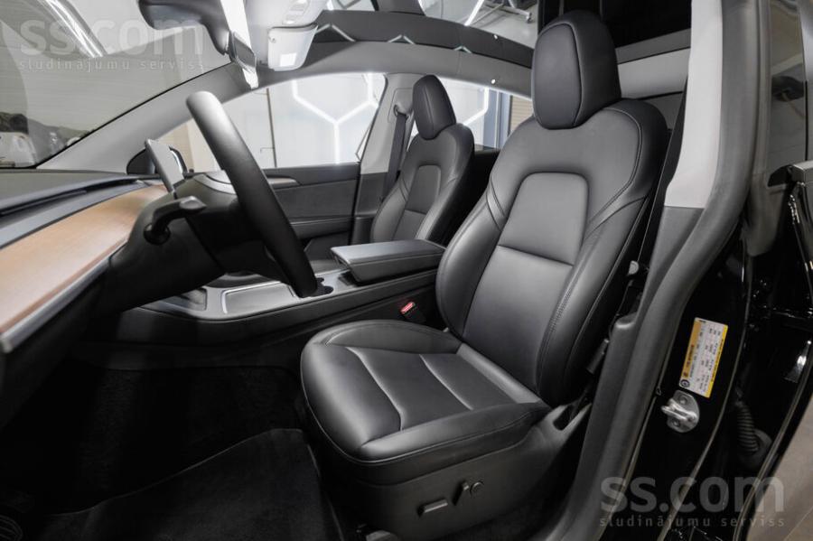 Black Tesla Model Y 2022 in Riga, with an engine capacity of 0.00 L and mileage of 79 thousand km for 34740 €, photo 12 on AUTOMOTO.COM.LV
