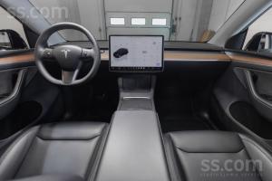Black Tesla Model Y 2022 in Riga, with an engine capacity of 0.00 L and mileage of 79 thousand km for 34740 €, photo 15 on AUTOMOTO.COM.LV