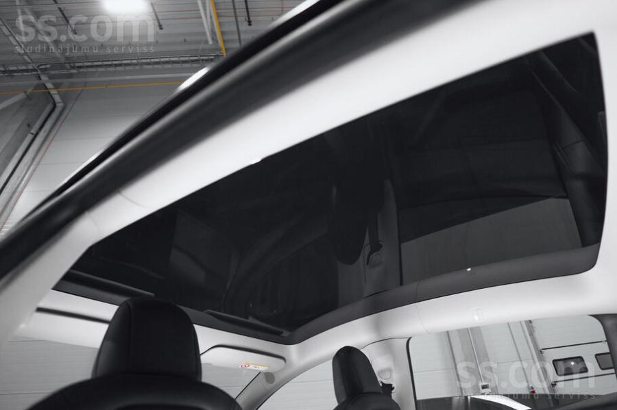 Black Tesla Model Y 2022 in Riga, with an engine capacity of 0.00 L and mileage of 79 thousand km for 34740 €, photo 25 on AUTOMOTO.COM.LV